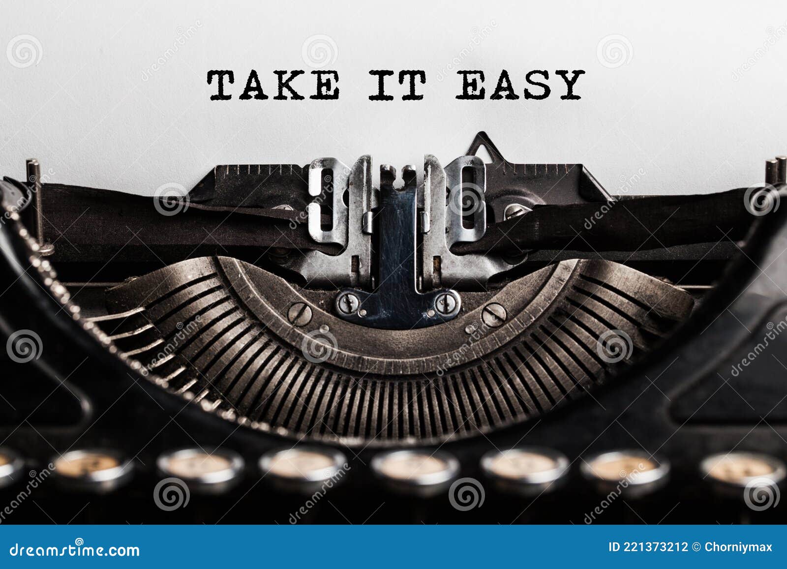 Take it Easy Slogan Writen by a Typewriter Stock Photo - Image of text ...