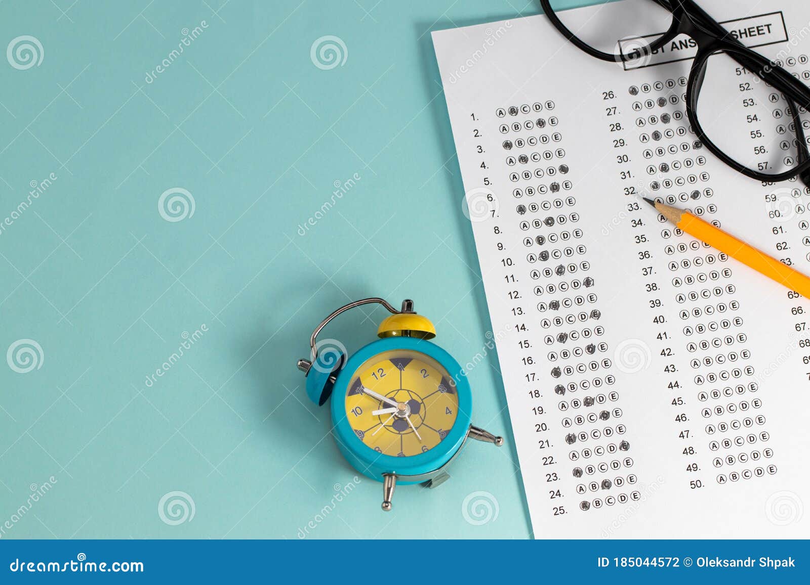Take The Exam. Exam Sheet Near Glasses And Pencil On Blue Background ...