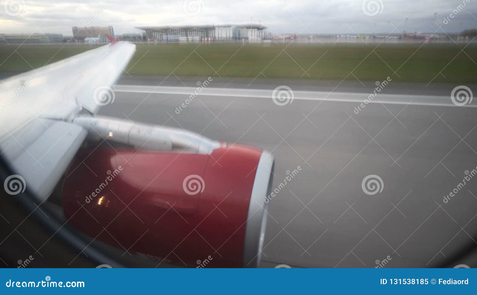 Take Off of Jet Planewith Red Engine Under the Wing Stock Video - Video ...