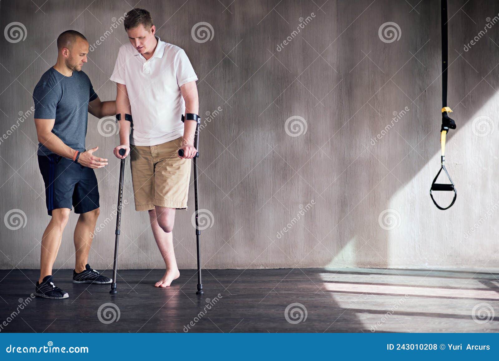 Take it One Step at a Time. Studio Shot of a Young Amputee Training in ...