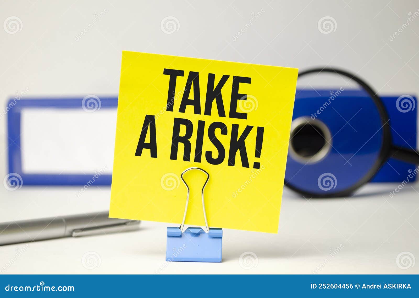Take a Risk Text on Yellow Sticker and File Folder Stock Photo - Image ...