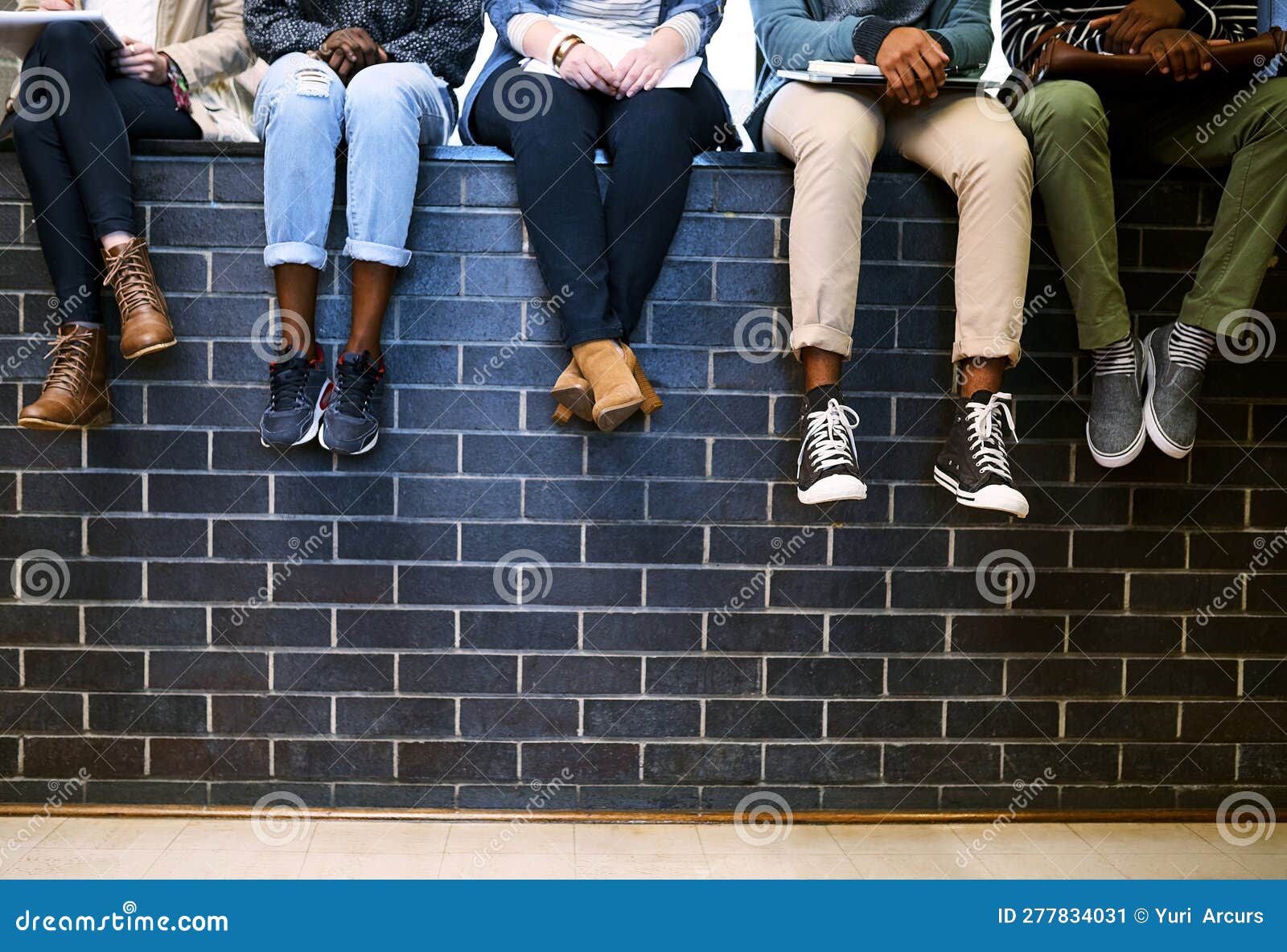 Take the Steps Towards Higher Education. a Group of Students Sitting on ...