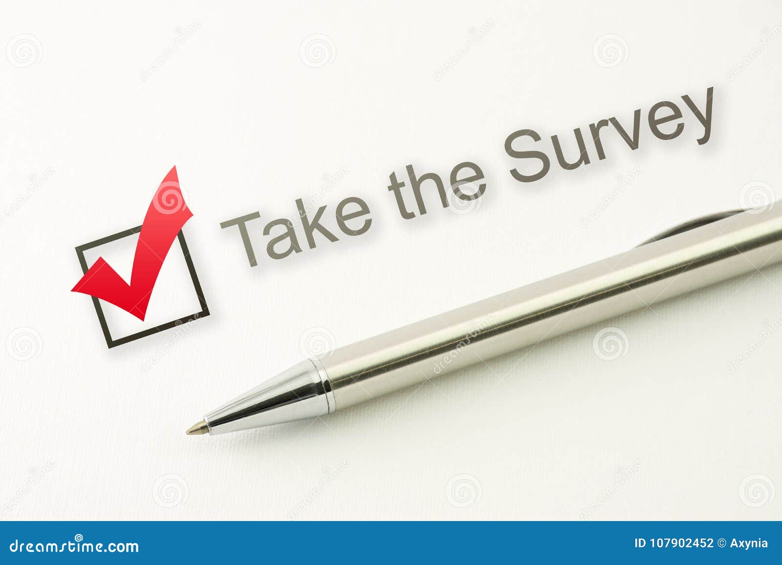 Take Survey Check Box with a Pen on Paper Background Stock Photo ...