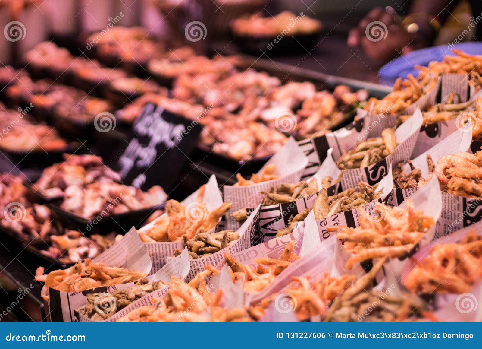 Takeaway. Fried Prawns, Octopus and Squid in Paper Cones Stock Photo ...