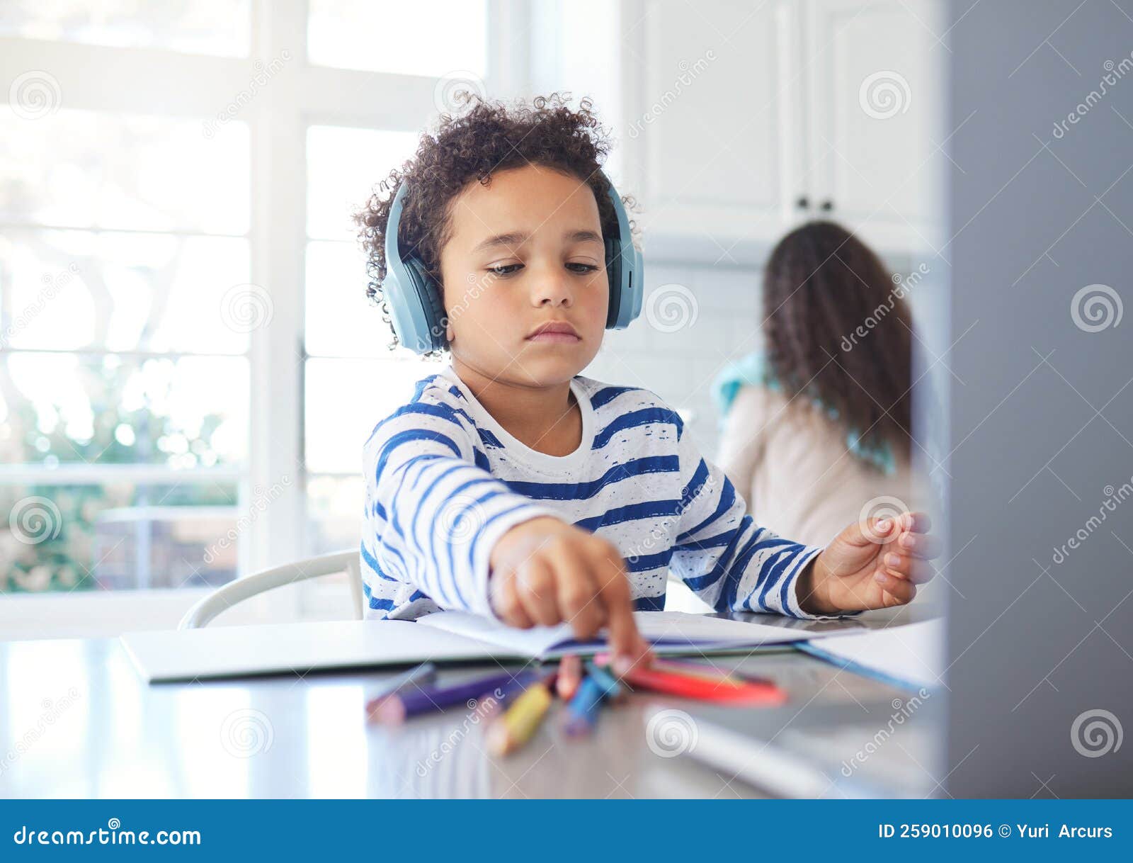 He Takes His Online Classes Seriously. a Little Boy Doing His Homework ...