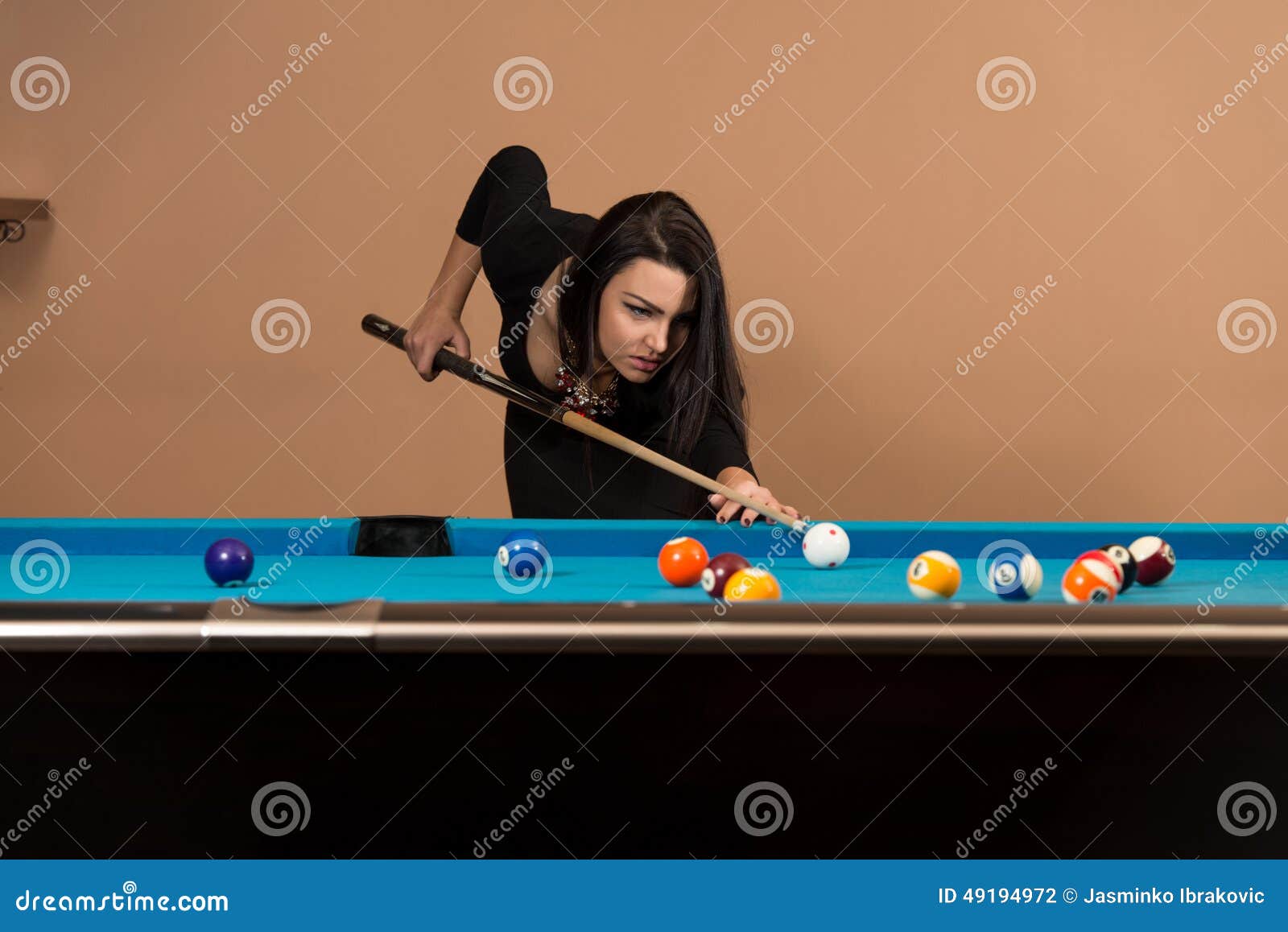 Taking Aim To Shoot the One Ball Stock Photo - Image of adult, person ...