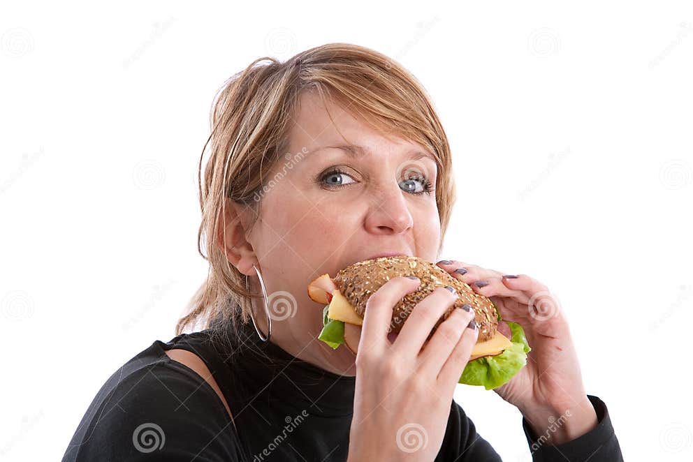 Taking a big bite stock photo. Image of cheese, biting - 8282410