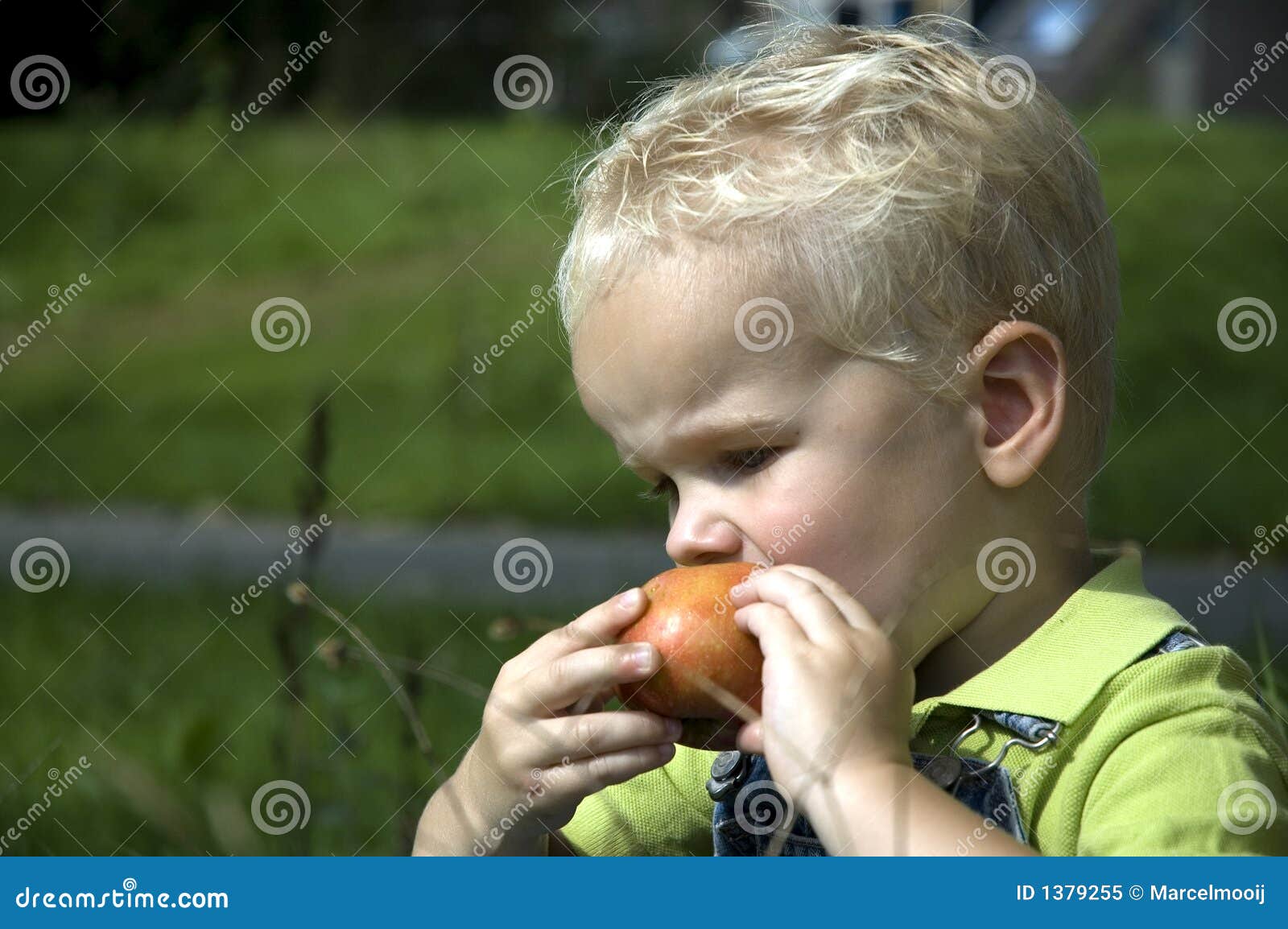Taking a bite -2 stock image. Image of relaxed, biting - 1379255