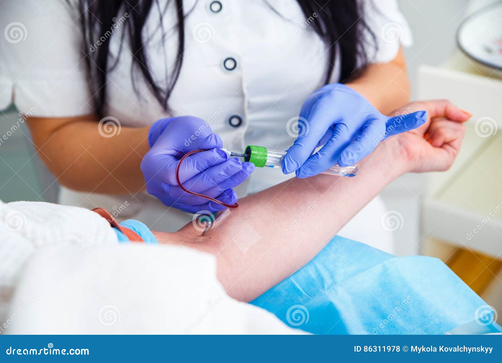 Taking a blood sample stock photo. Image of equipment - 86311978
