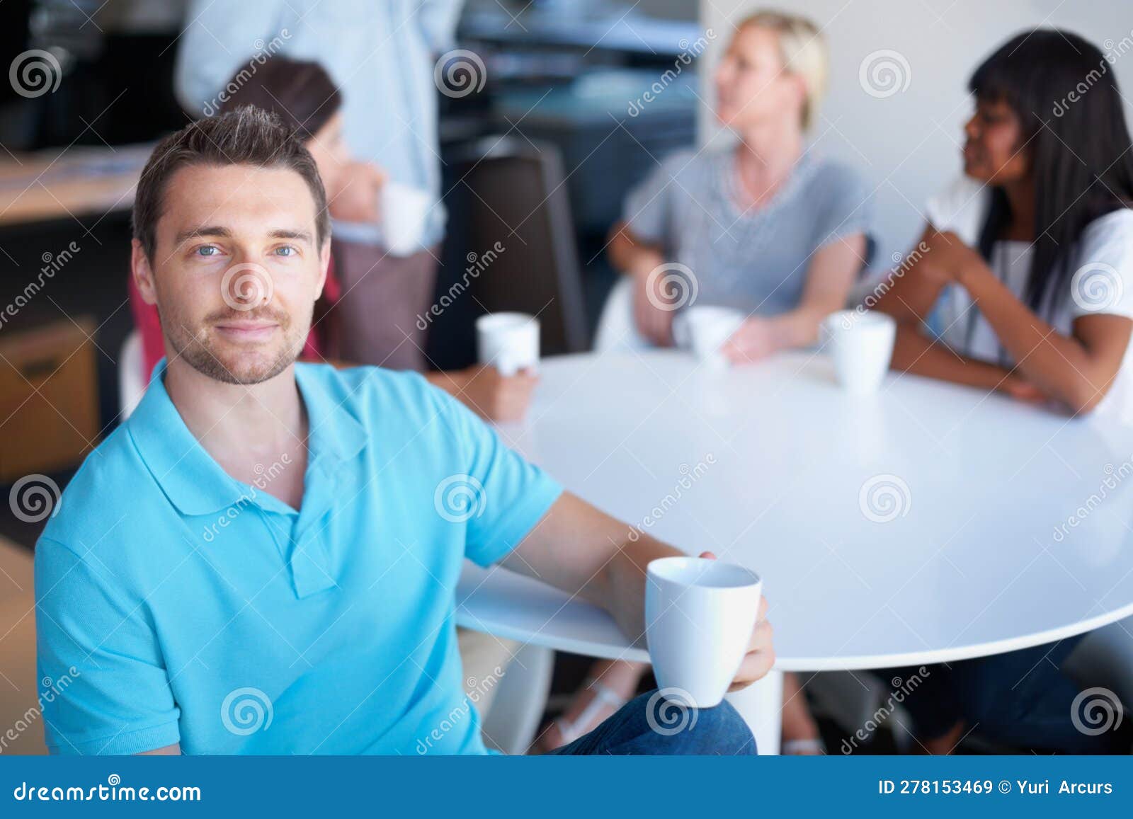Taking a Break in the Cafeteria. a Group of Coworkers Sitting in the ...