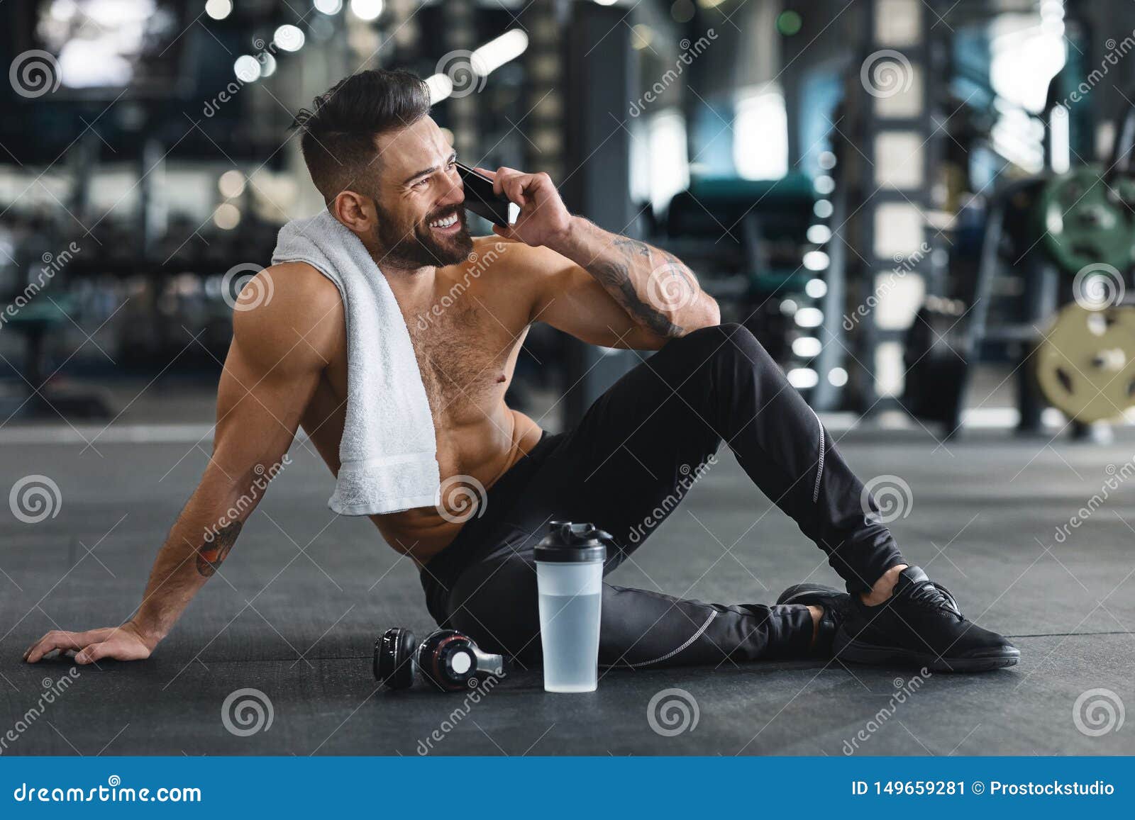Muscular Guy Talking on Cellphone after Training at Gym Stock Image ...