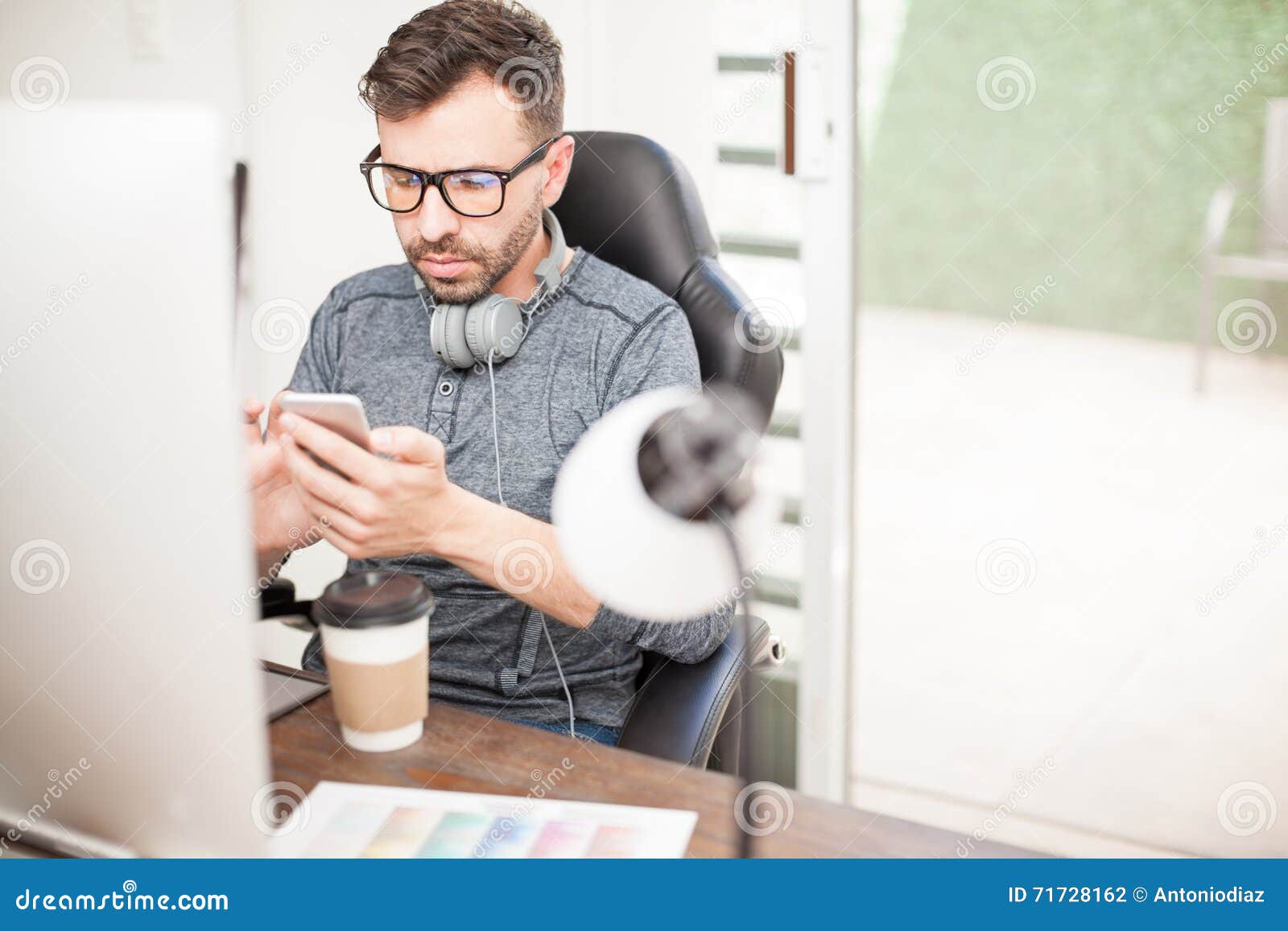 Taking a Break from Work and Using Smartphone Stock Photo - Image of ...