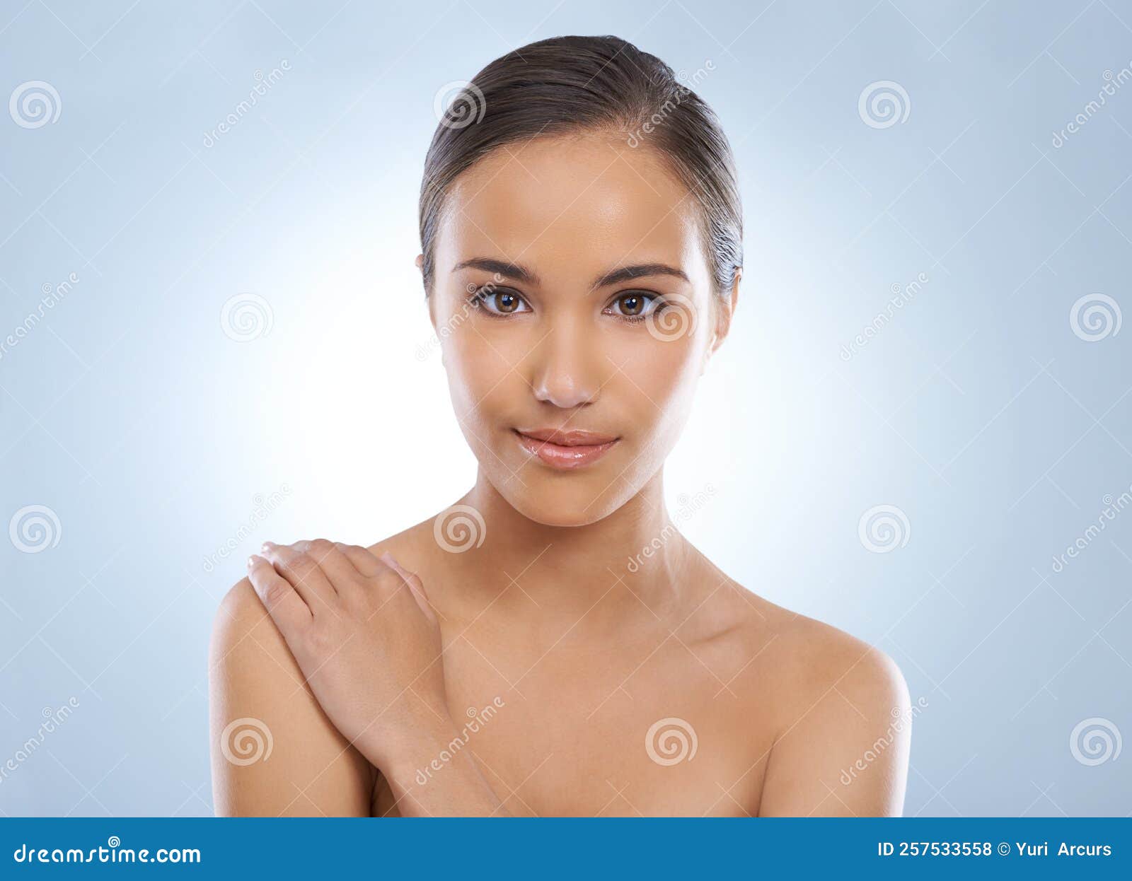 Taking Care of Her Whole Body. Studio Head and Shoulders Shot of an ...