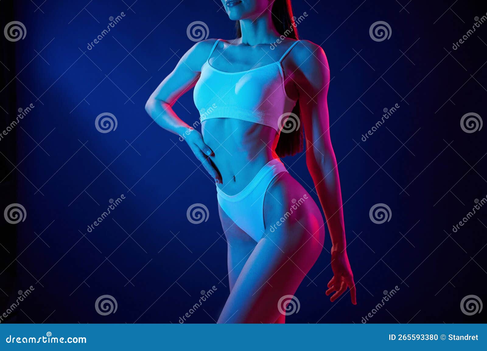 Taking a Closer Look. Young Woman in Underwear is in the Studio with ... Taking a Closer Look. Young Woman in Underwear is in the Studio with ...