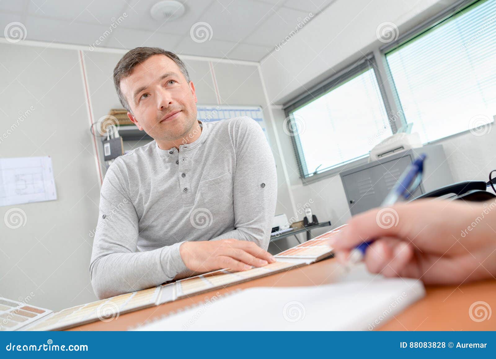 Taking Down Notes during Meeting Stock Photo - Image of businessman ...