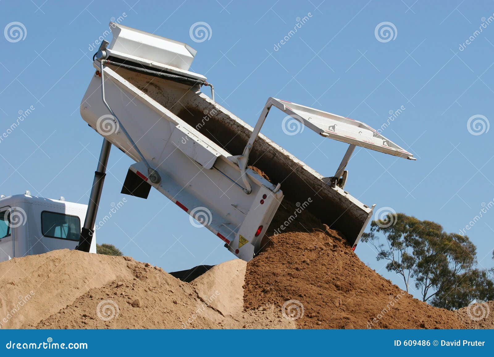 Taking a Dump stock photo. Image of dump, truck, unload - 609486