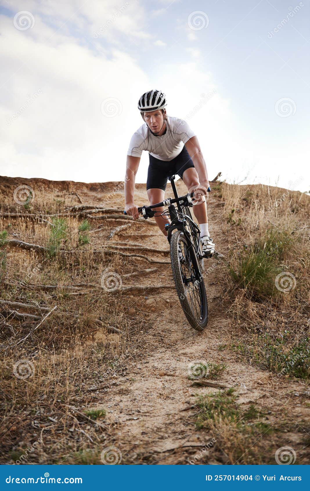 Taking His Bike Along the Trails. a Cyclist Riding Outdoors. Stock ...