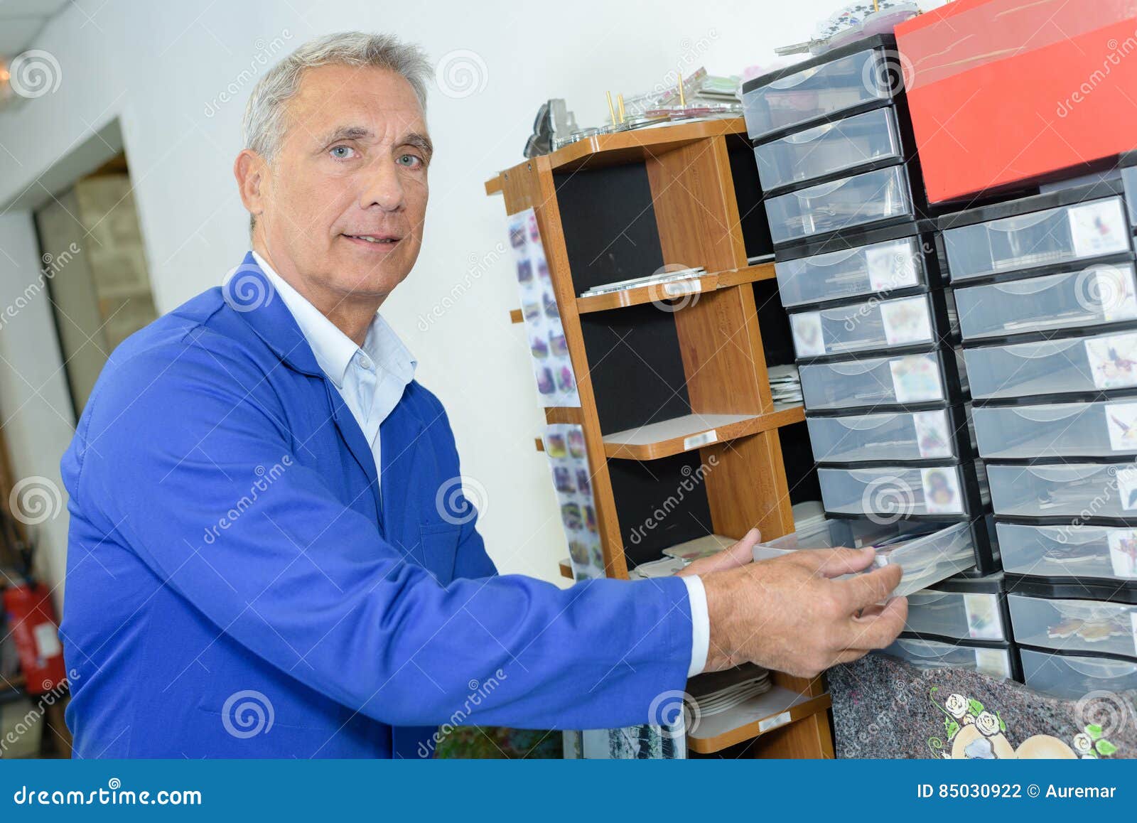 Taking items from drawer stock photo. Image of items - 85030922