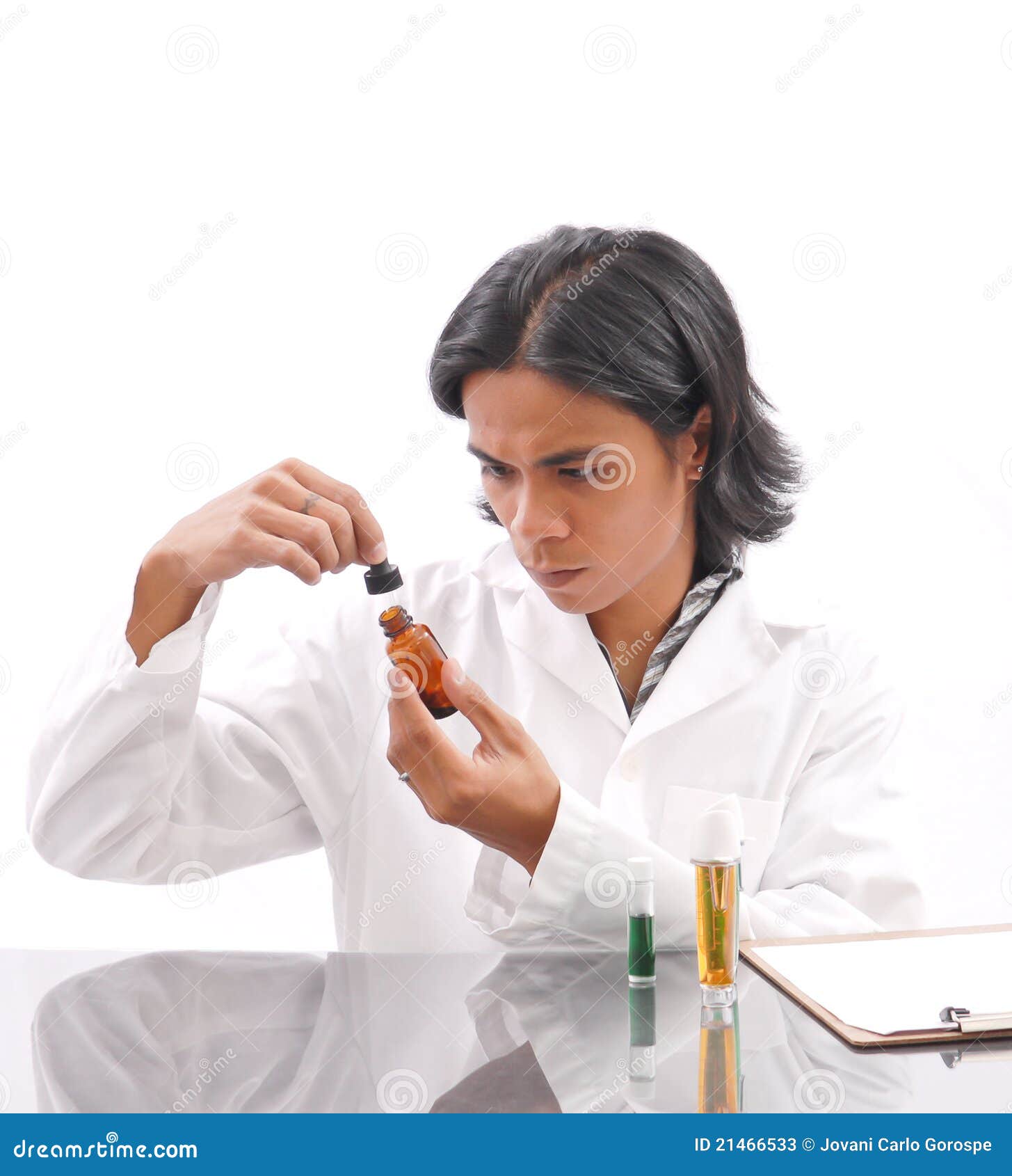 Taking a Medicine Sample stock image. Image of biotechnology - 21466533