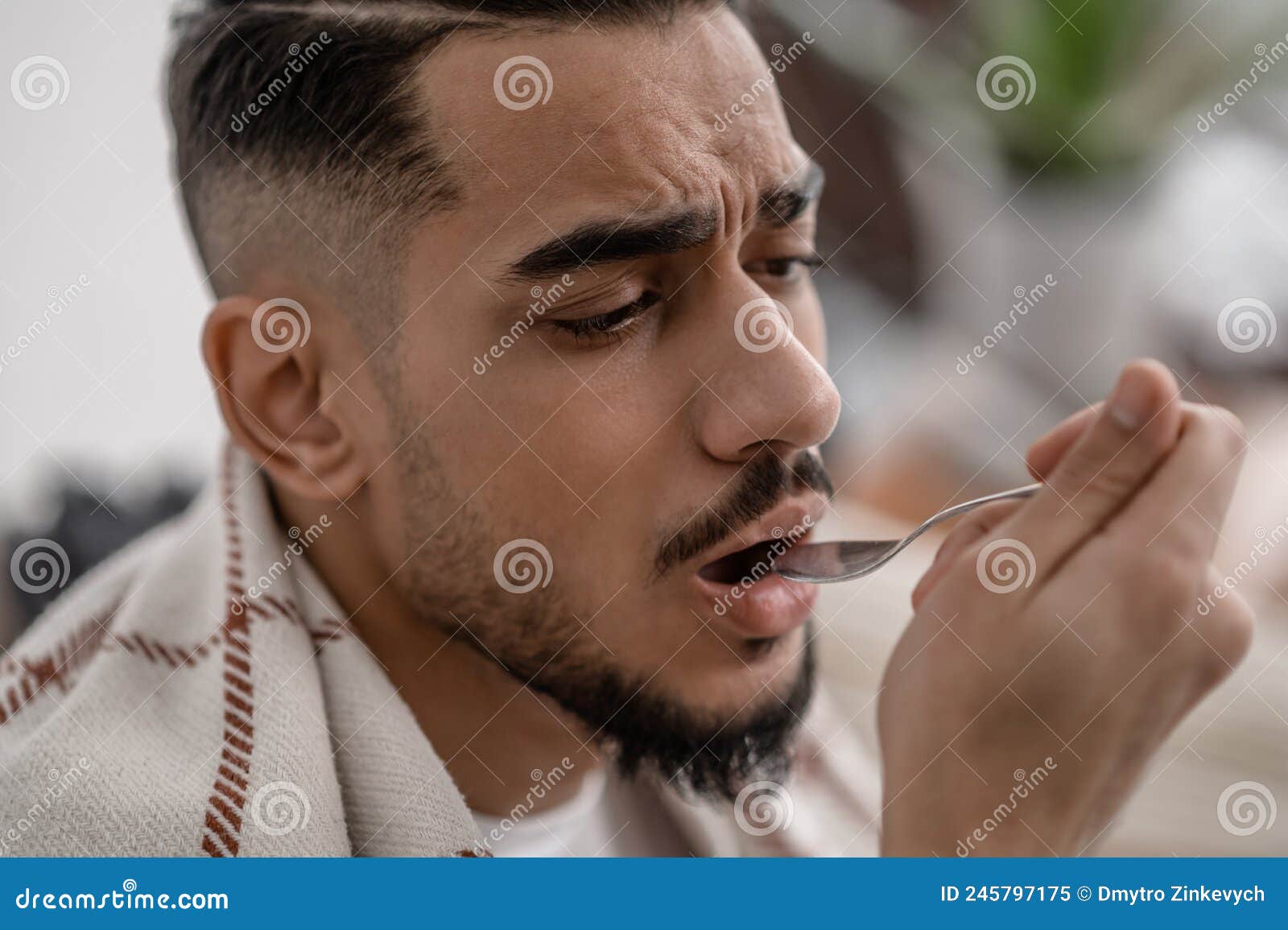A Sick Man Taking a Spoon with Medicine Stock Image - Image of ...