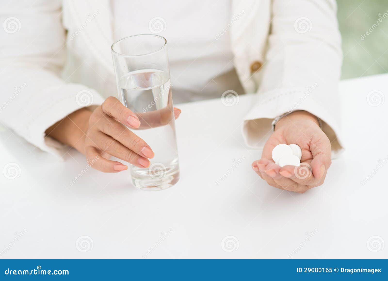 Taking meds stock image. Image of drinking, holding, table - 29080165