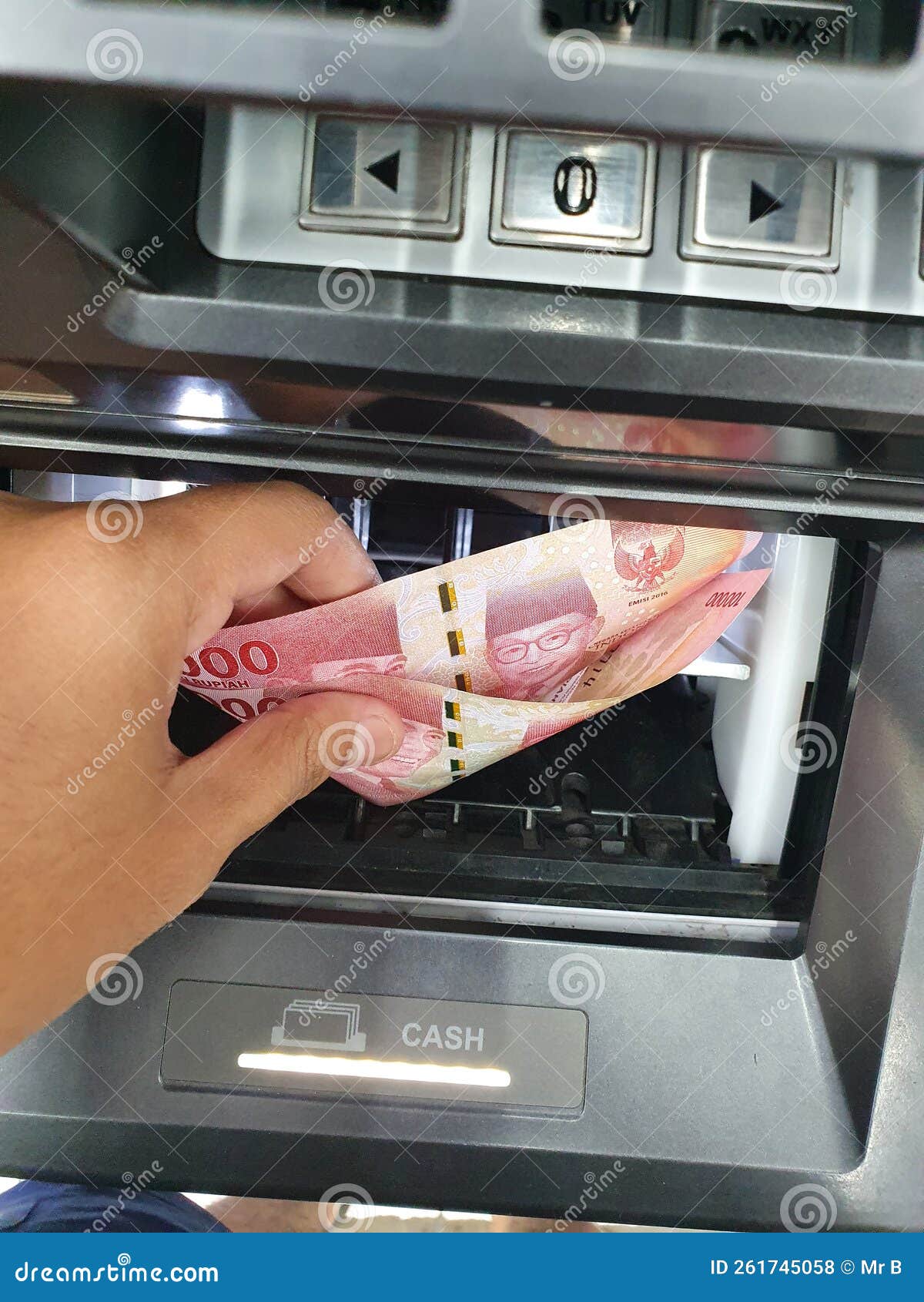 Taking money from ATM stock photo. Image of limb, person - 261745058