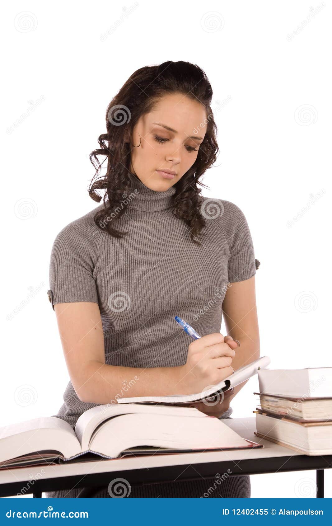 Taking notes from book stock image. Image of sitting - 12402455