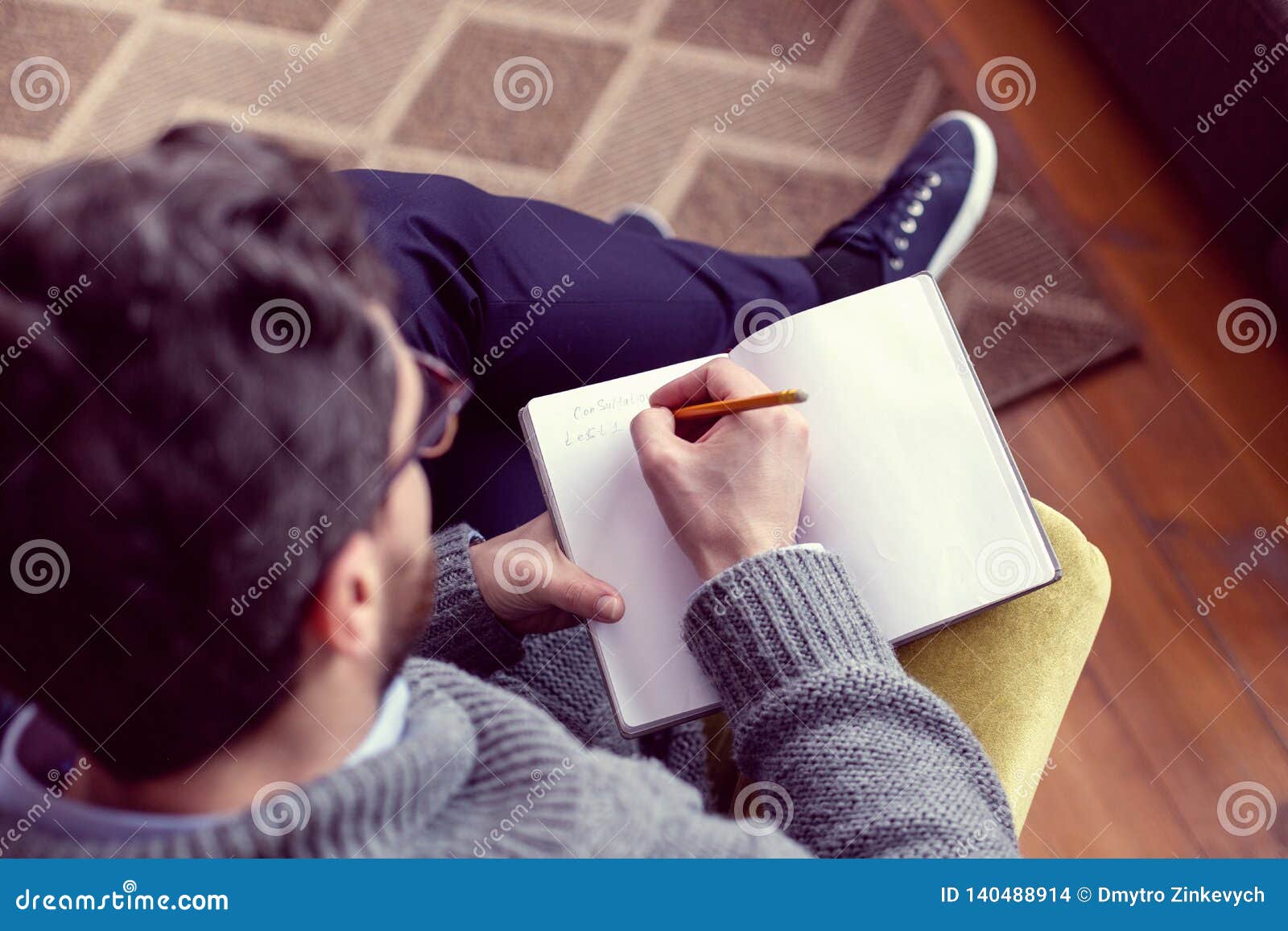 Top View of a Serious Smart Man Writing Stock Photo - Image of note ...