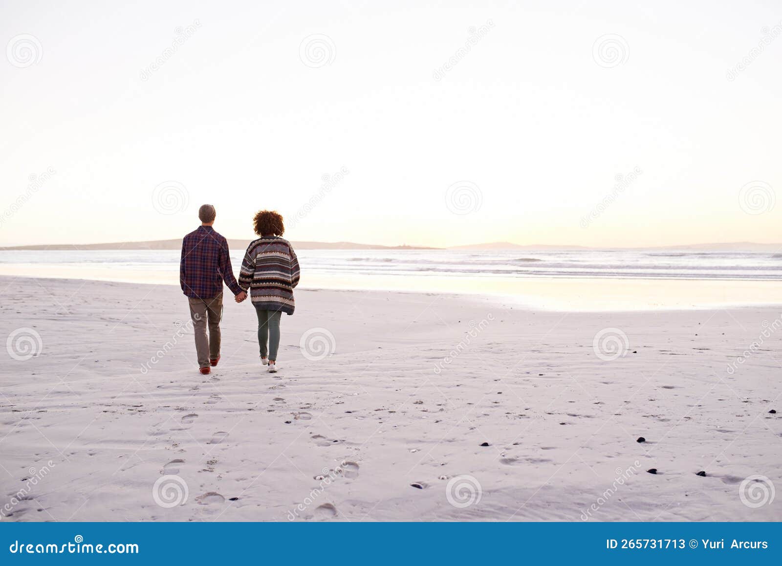 Taking it One Step at a Time. a Young Couple Enjoying a Walk on the ...