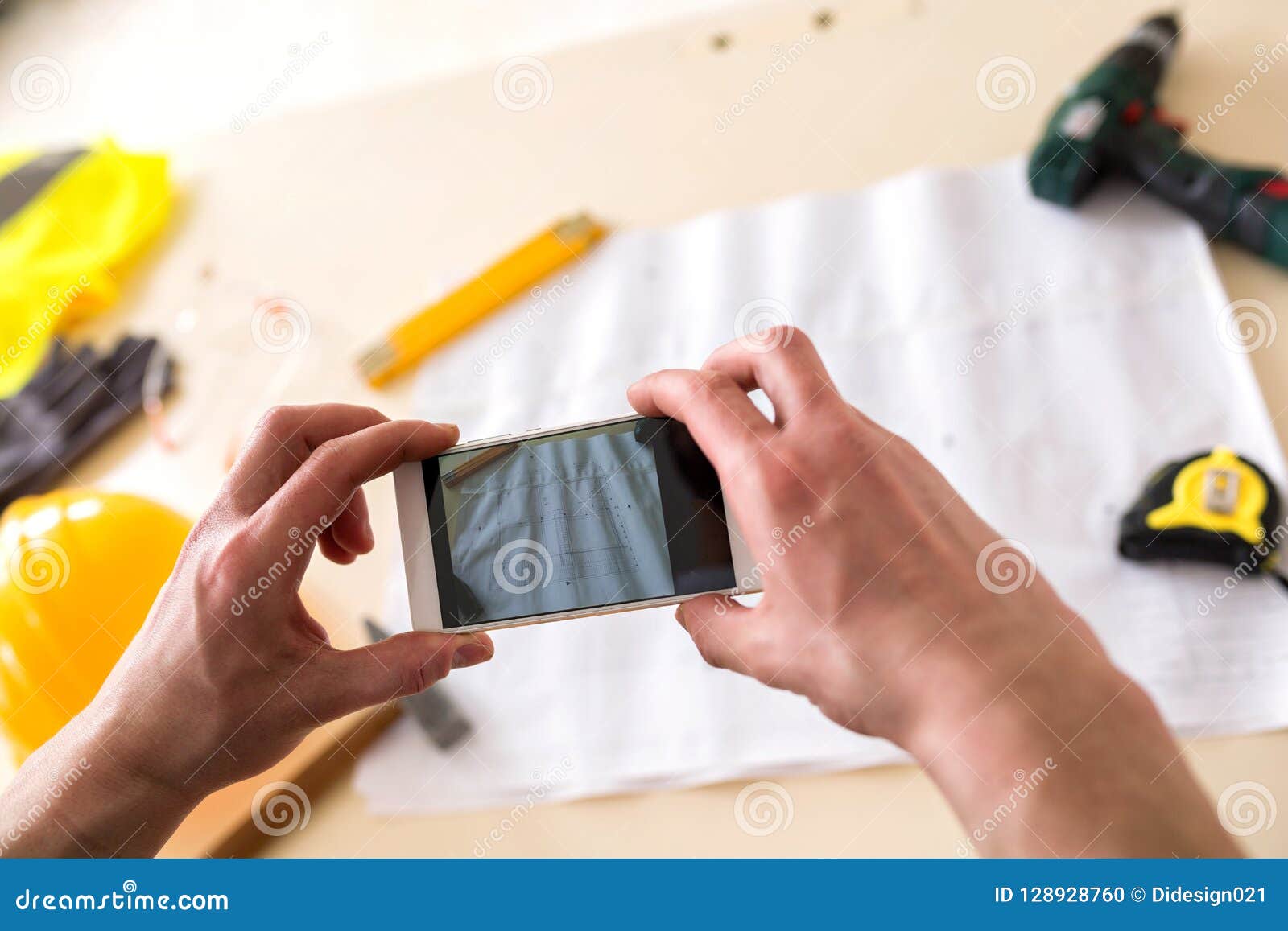 Taking a Pic of Project Plans Stock Photo - Image of looking ...
