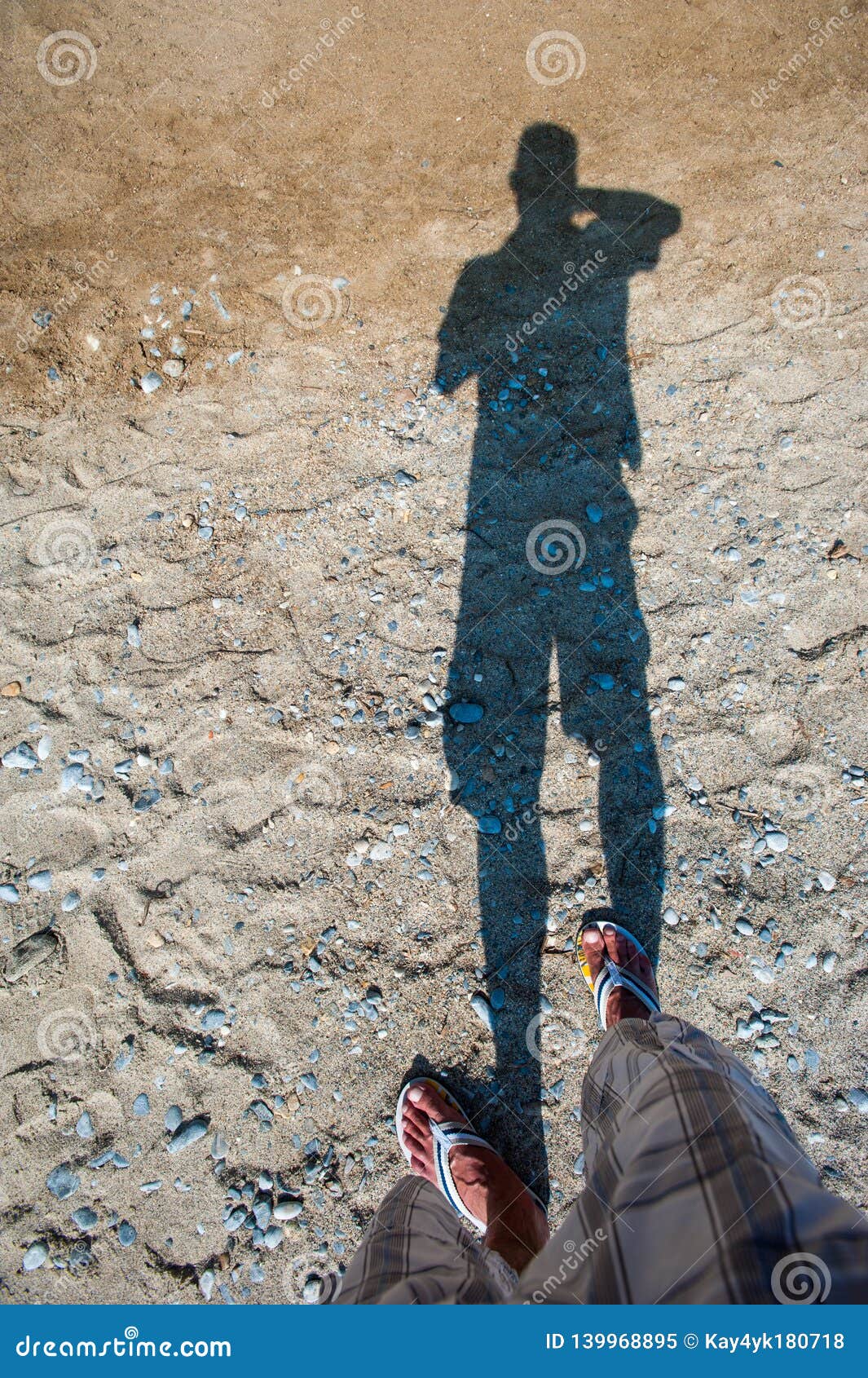 Taking Pictures of His Shadow on the Beach Stock Image - Image of ...