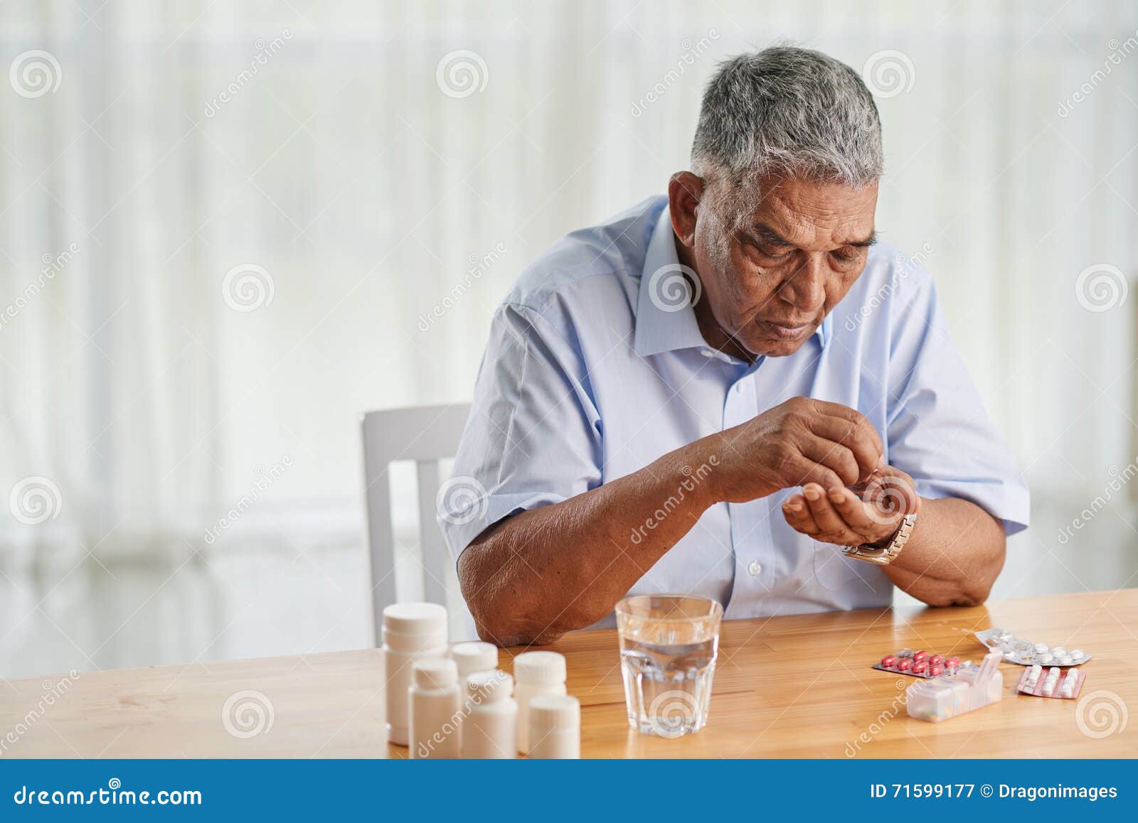 Taking pills stock image. Image of supplement, drug, medicine - 71599177
