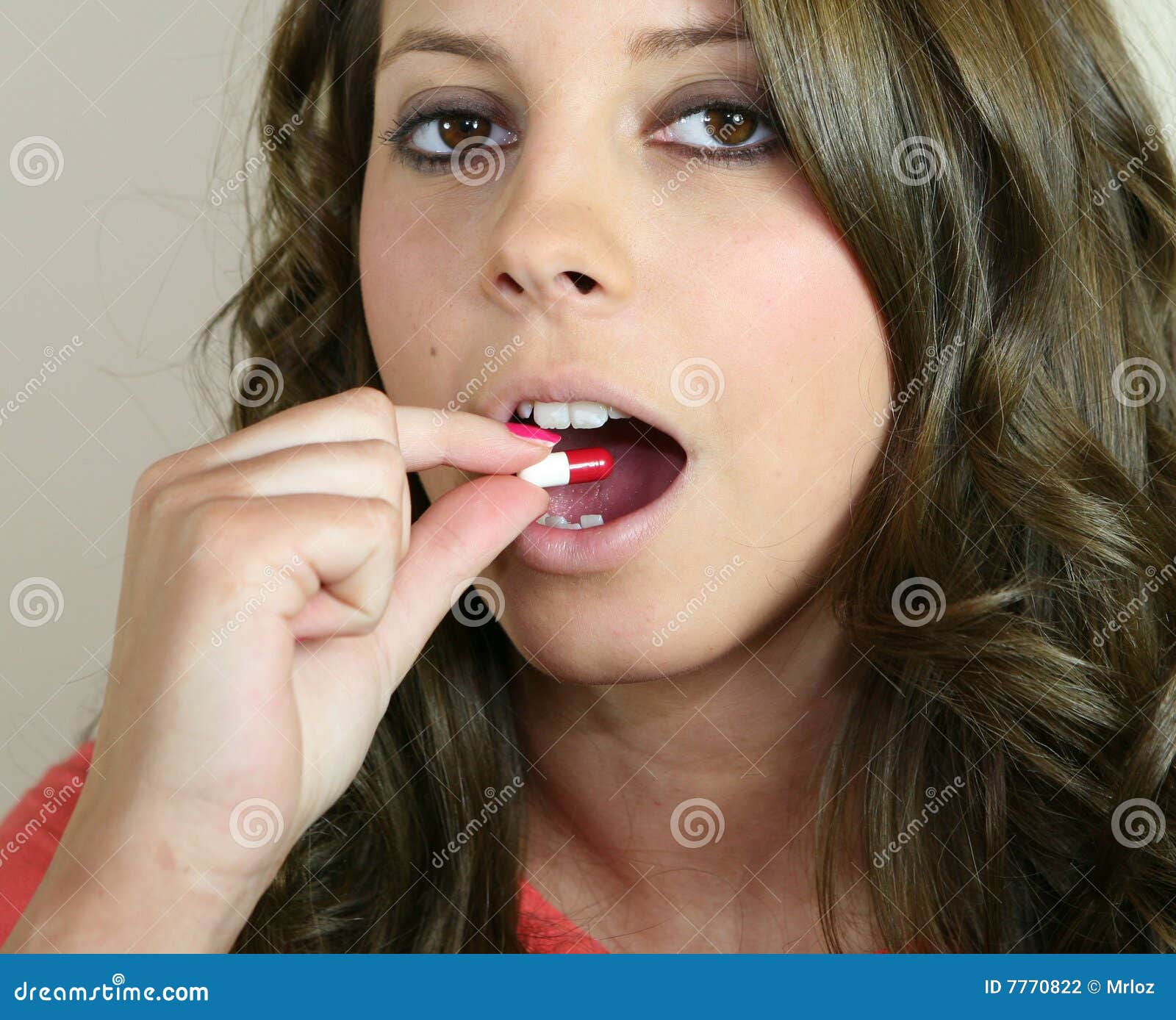 Taking the red pill stock photo. Image of lips, aspirin - 7770822