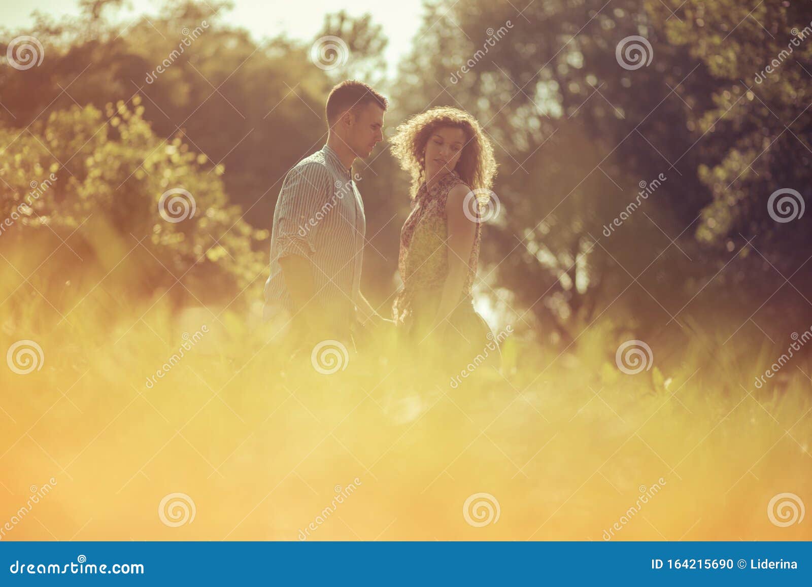 Taking a romantic stroll stock photo. Image of bonding - 164215690