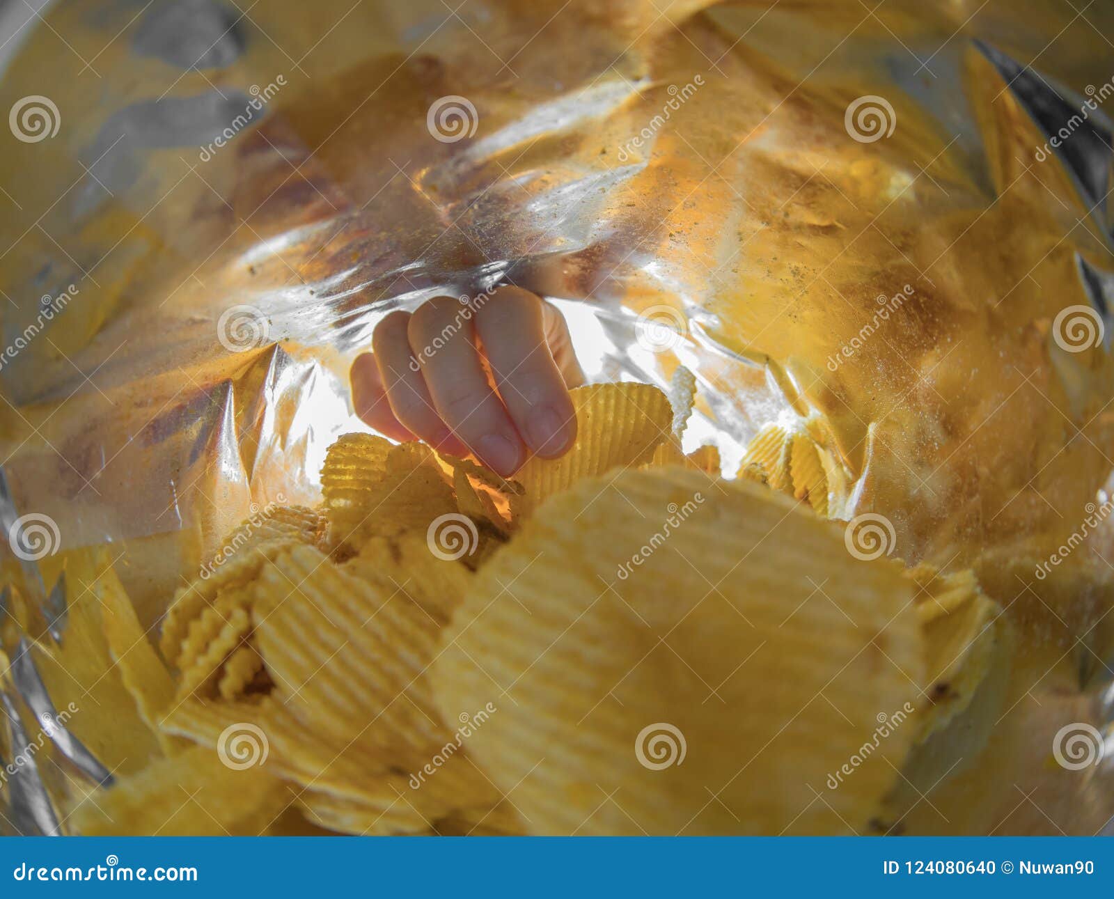 Taking Salty Snacks Inside the Bag Stock Photo - Image of diet, home ...