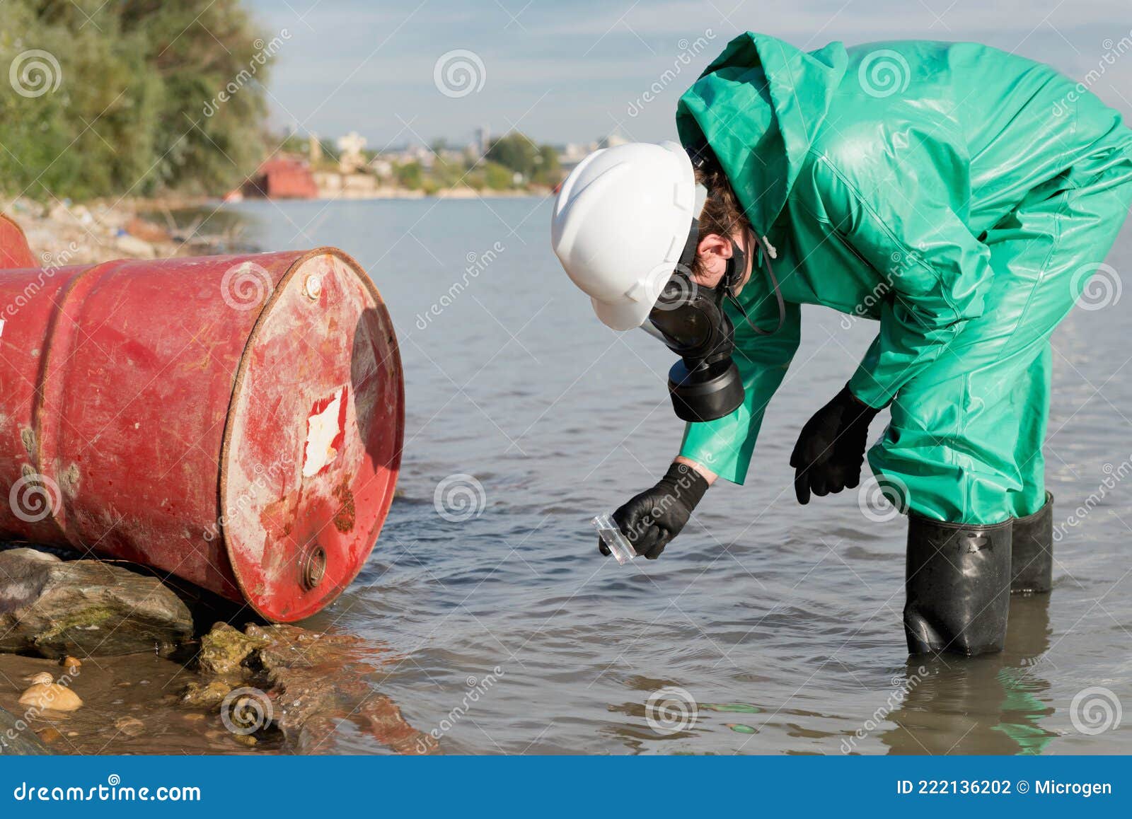 Taking sample of water stock photo. Image of protective - 222136202