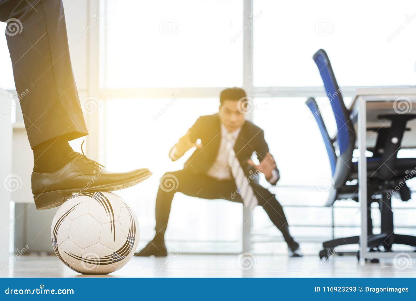 Playing Football at Workplace Stock Image - Image of meeting, suit ...