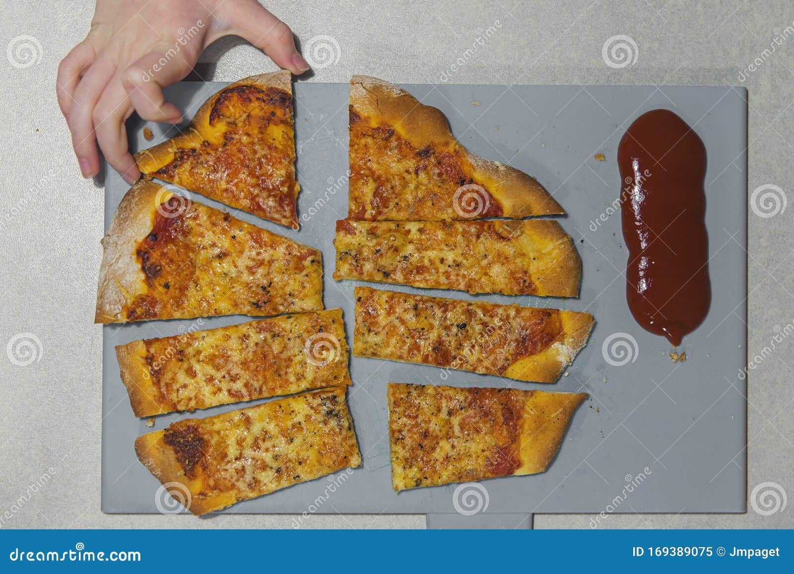 Taking a slice of pizza stock image. Image of homemade - 169389075