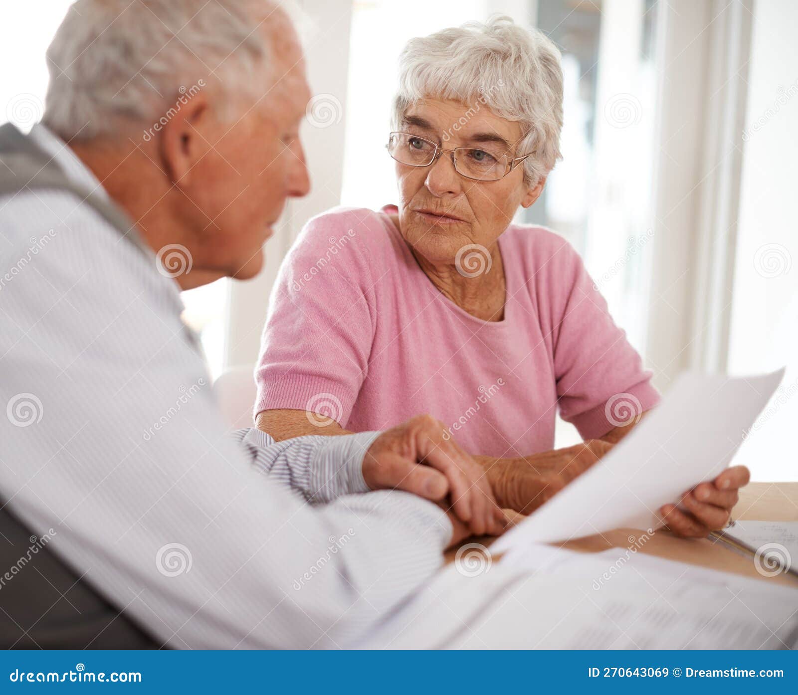 Taking Time To Discuss Important Matters. Shot of Two Elderly People ...