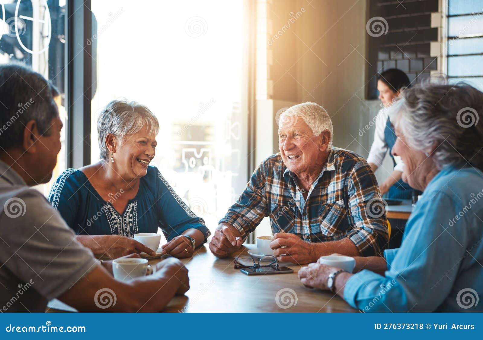 Taking a Trip Down Memory Lane. Senior Couples on a Double Date at a Cafe. Stock Photo - Image ...