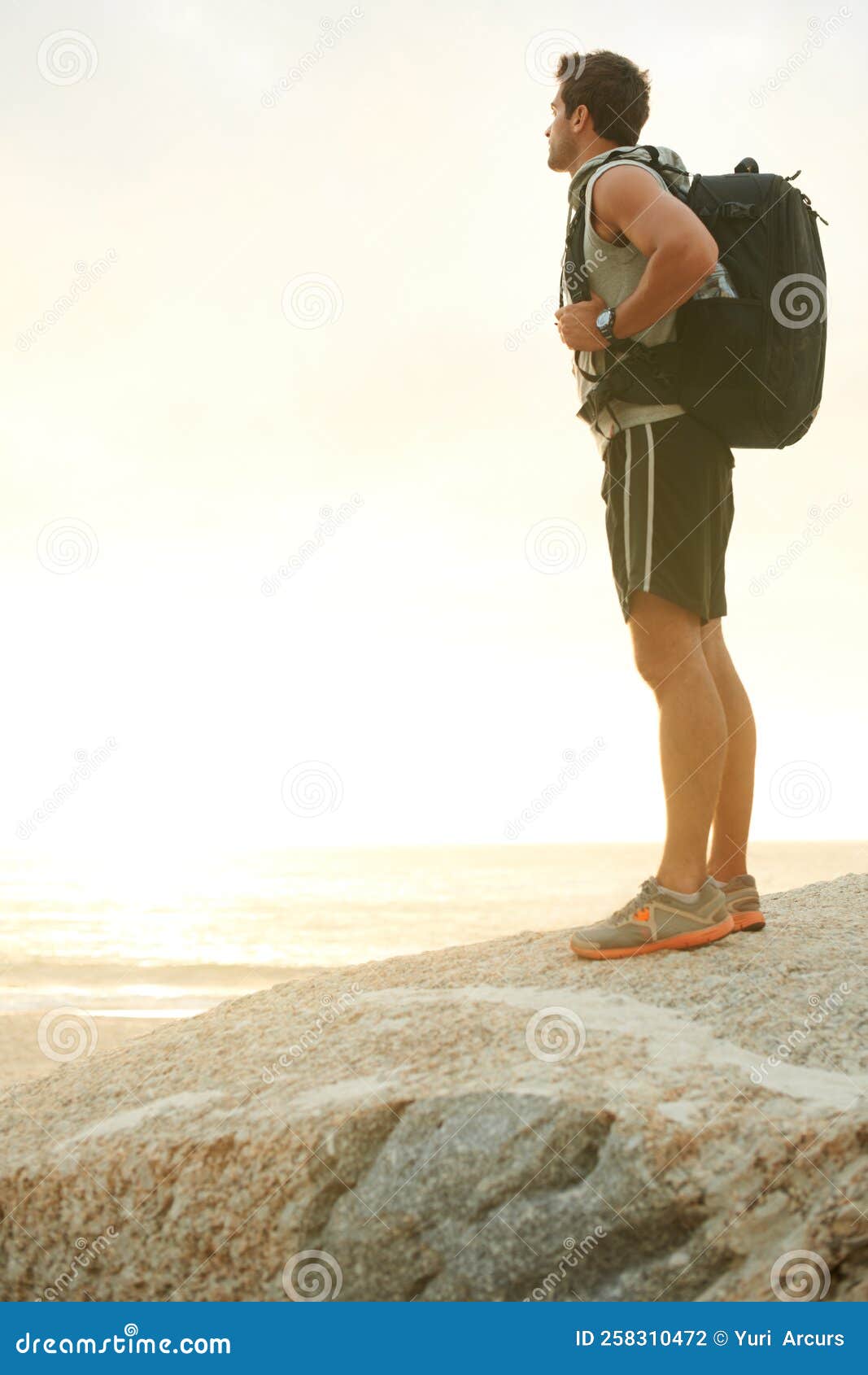 Taking in the View. Young Hiker Standing and Looking at the View. Stock ...