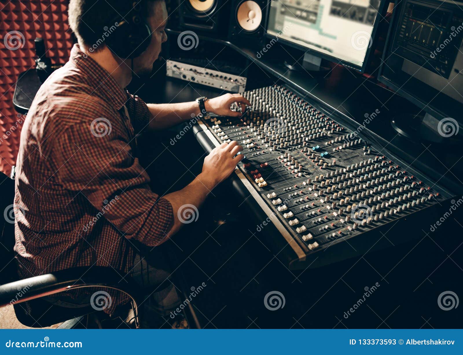 Talented Guy Working in the Music Studio. Man is Creating a Hit Stock ...