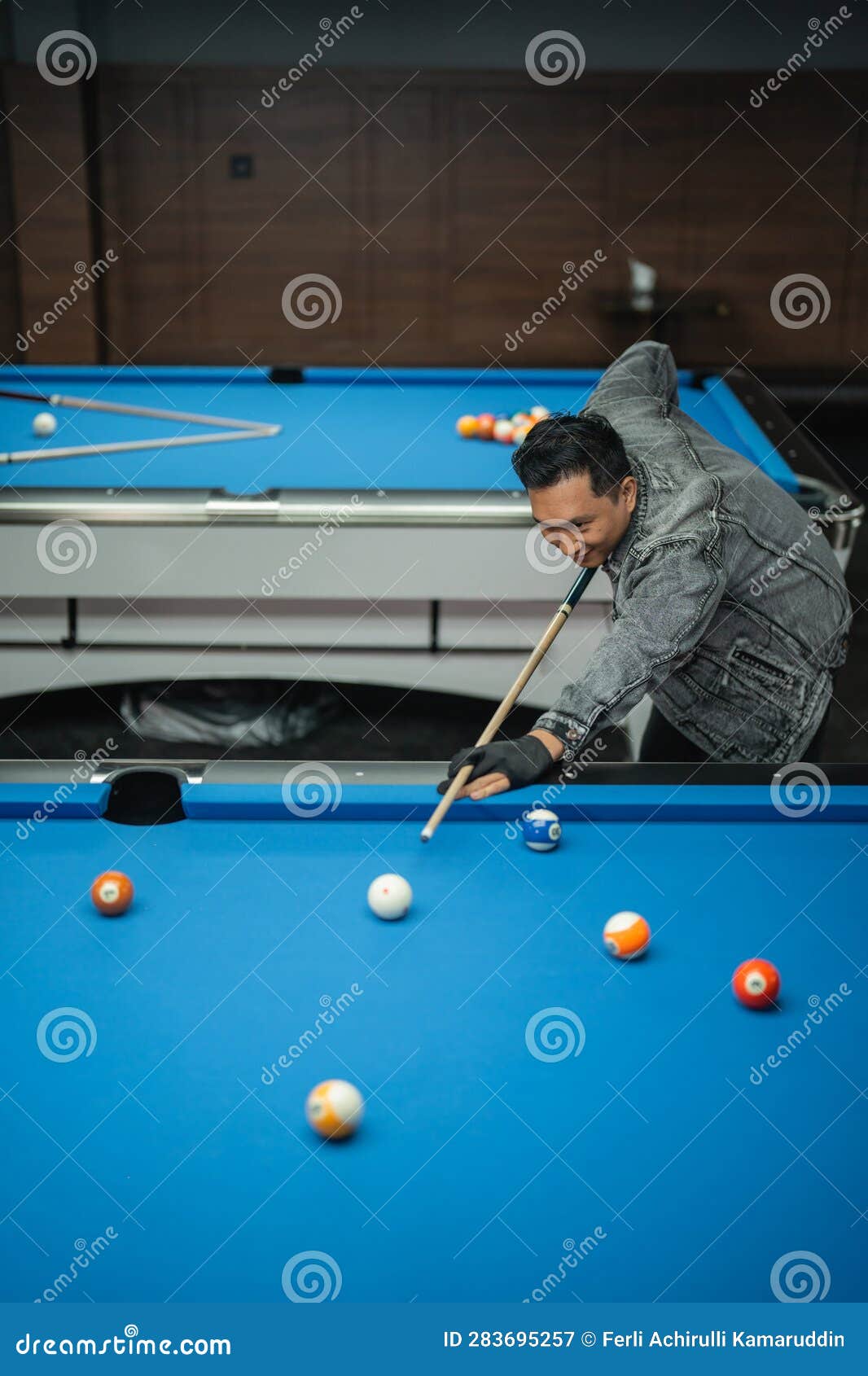 Talented Pool Player Poking the White Ball Stock Image - Image of ...