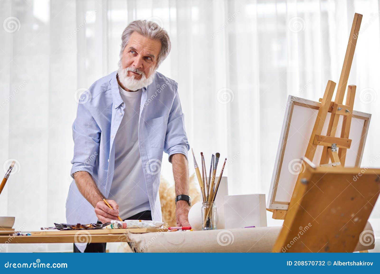 Talented and Skilled Caucasian Artist during Work Stock Photo - Image ...