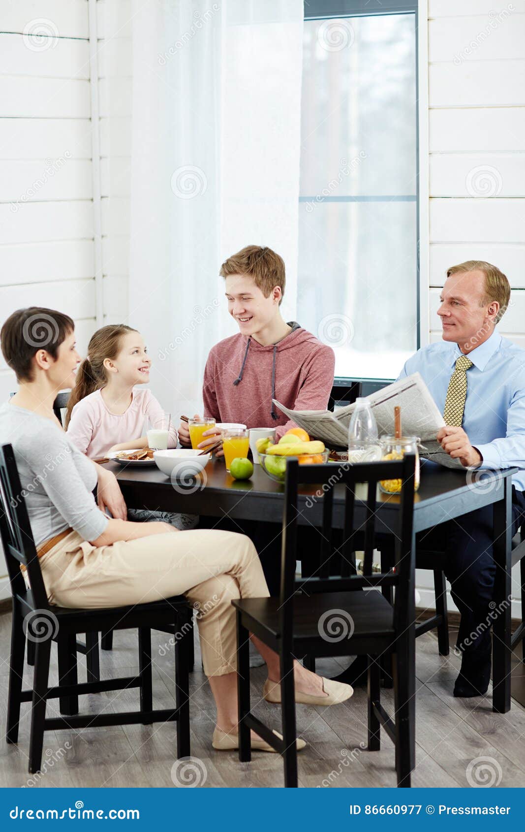 Talk by kitchen table stock image. Image of mother, family - 86660977
