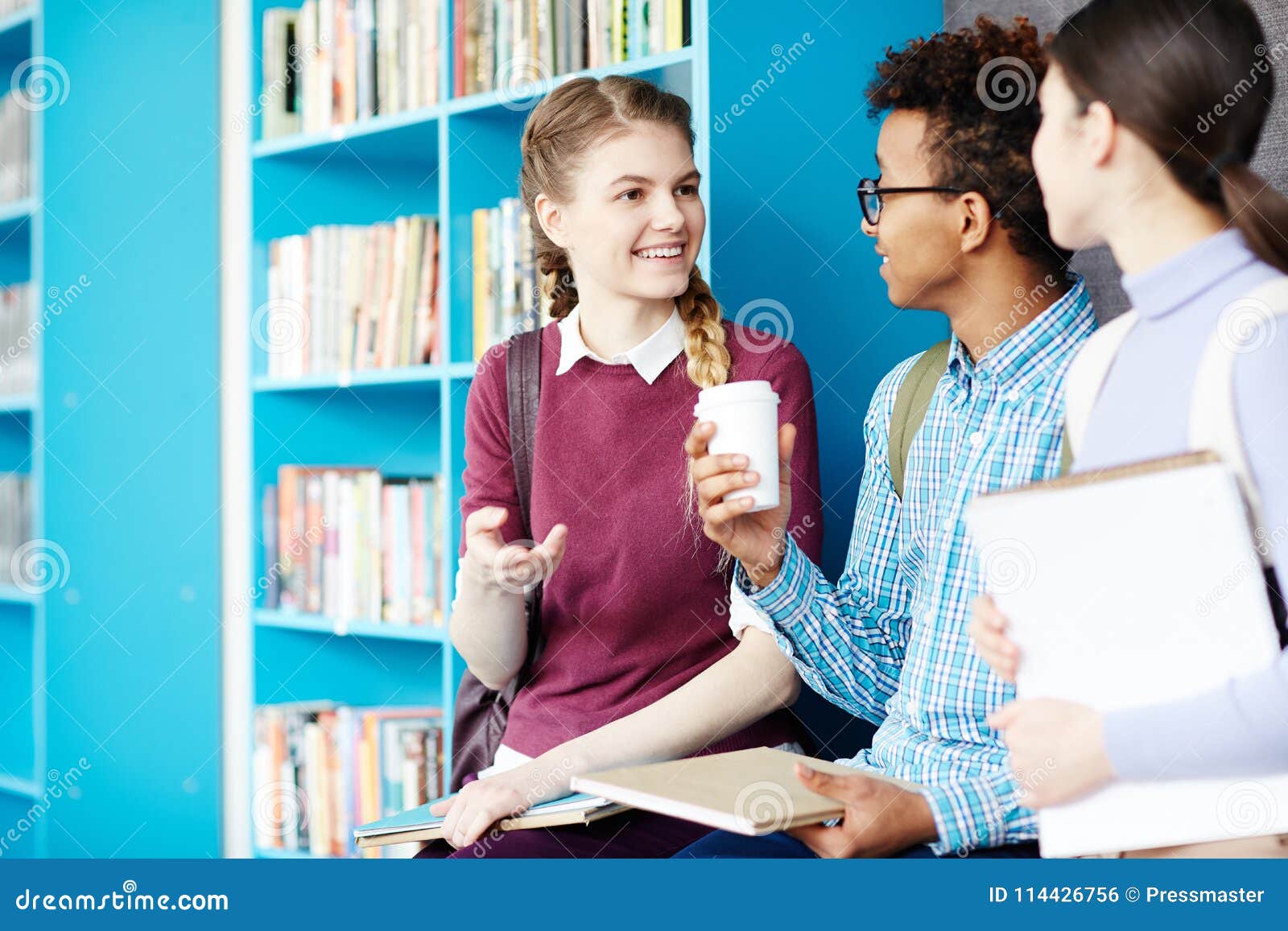 Talk of students stock photo. Image of discussing, backtoschool - 114426756