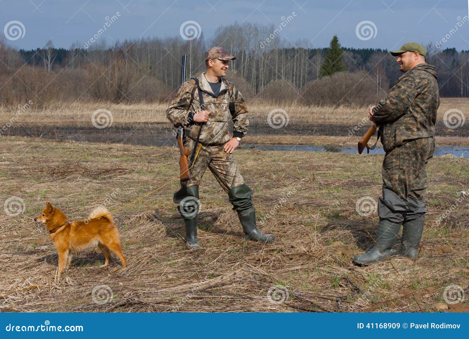 Talk of two hunters stock image. Image of camouflage - 41168909