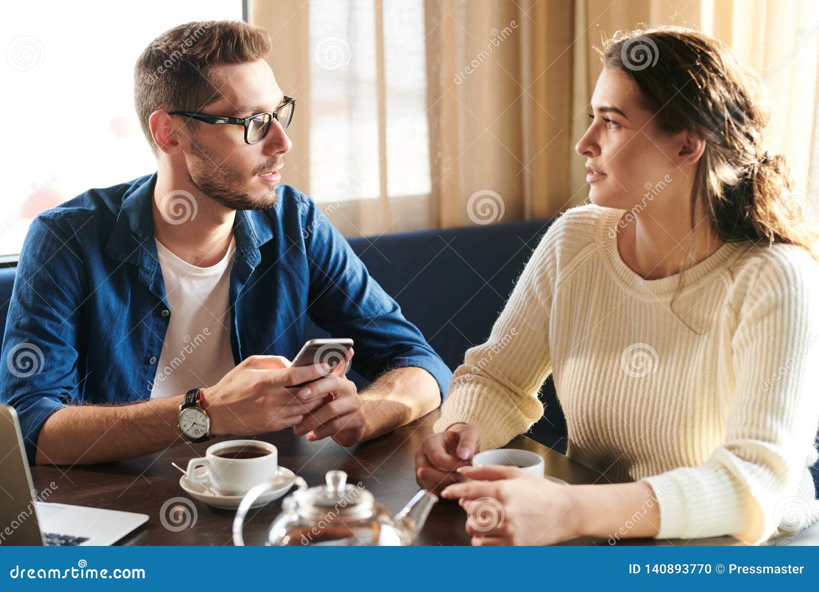 Talking by cup of tea stock photo. Image of discussing - 140893770