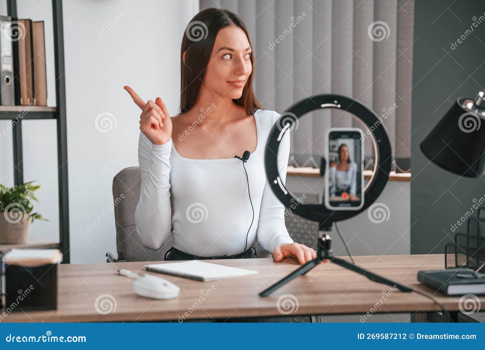 Talking, Doing Online Master Class. Young Beautiful Woman in White ...