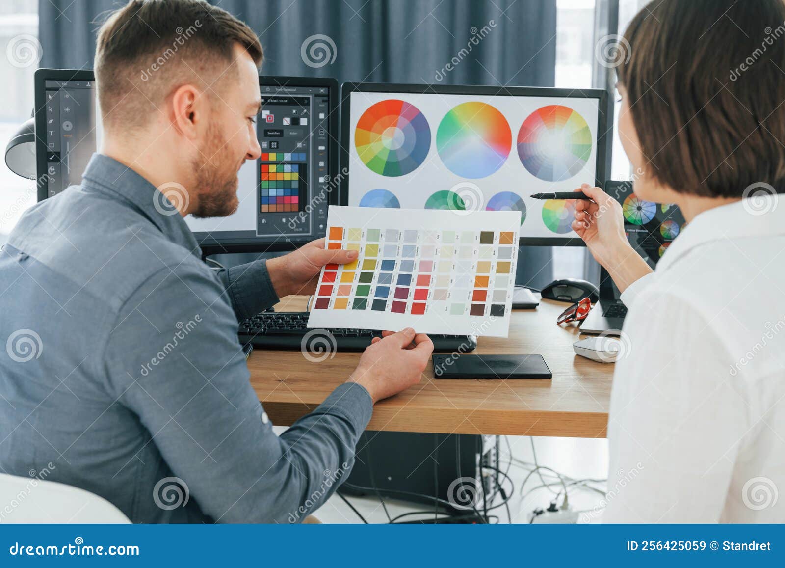 Talking with Each Other about New Ideas. Two Designers Working Together ...